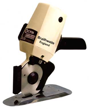 KM OCTA, 4" round knife cloth cutting machine. RS100